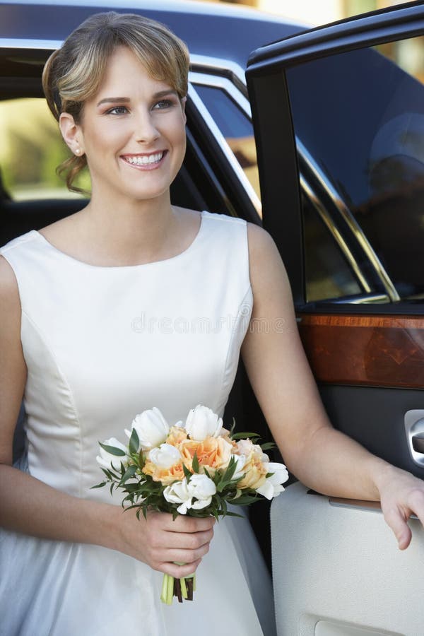 Bride Getting Down from Car Stock Photo - Image of holding, rose: 29657976