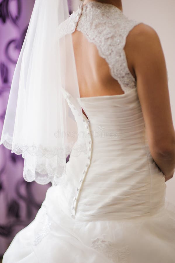 Bride getting dressed stock photo. Image of women, bride - 51757782