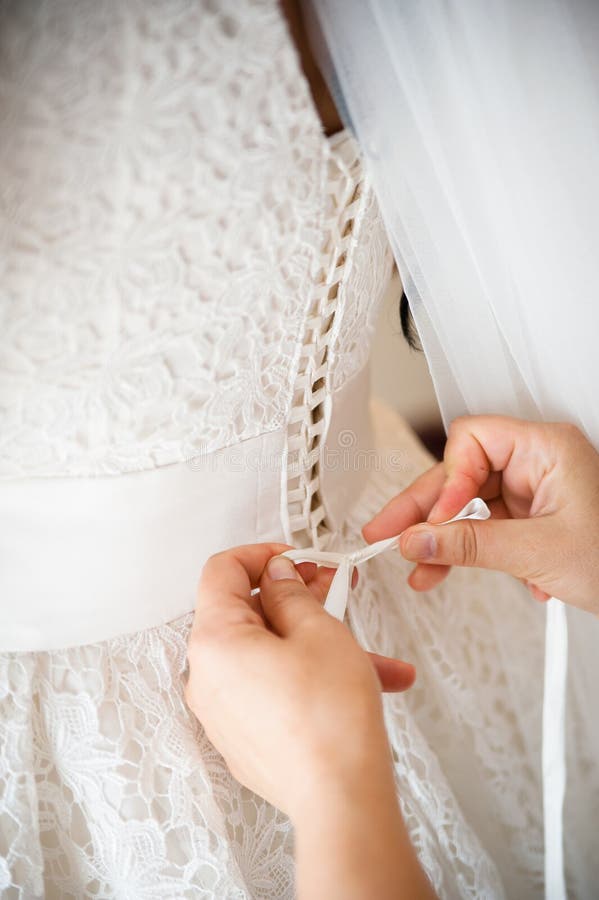 Bride getting dressed stock photo. Image of bride, weddings - 52190262