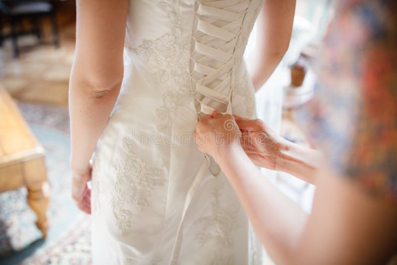 Bride getting dressed stock image. Image of white, accessory - 30181421