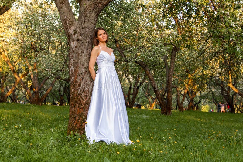 Bride and Girl Play by the Tree Stock Image - Image of girl, beauty ...