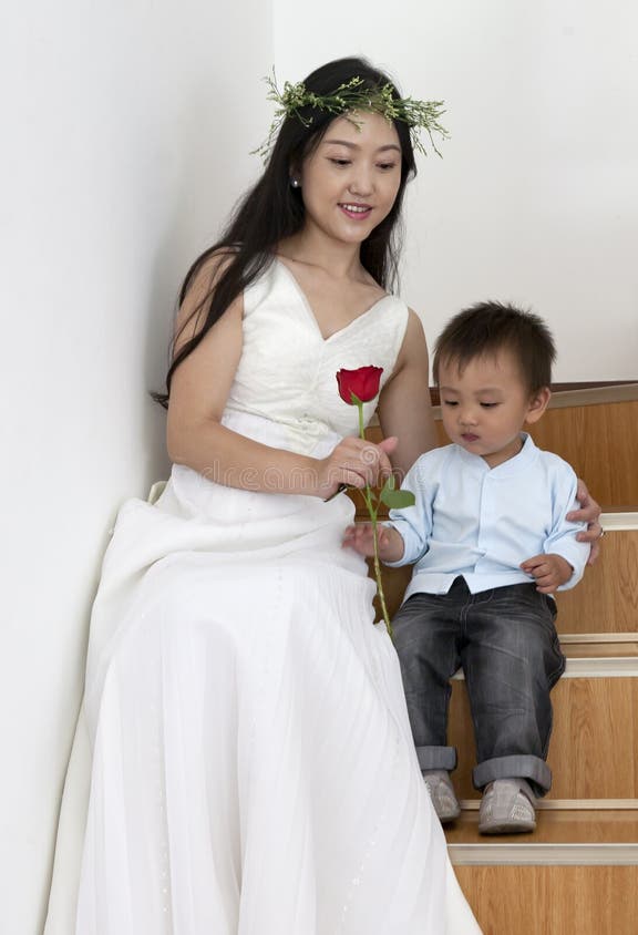 Bride giving son a rose stock photo. Image of give, mother - 23718518