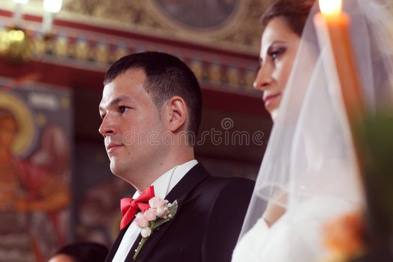Bride and groom in church stock image. Image of aisle - 40037123