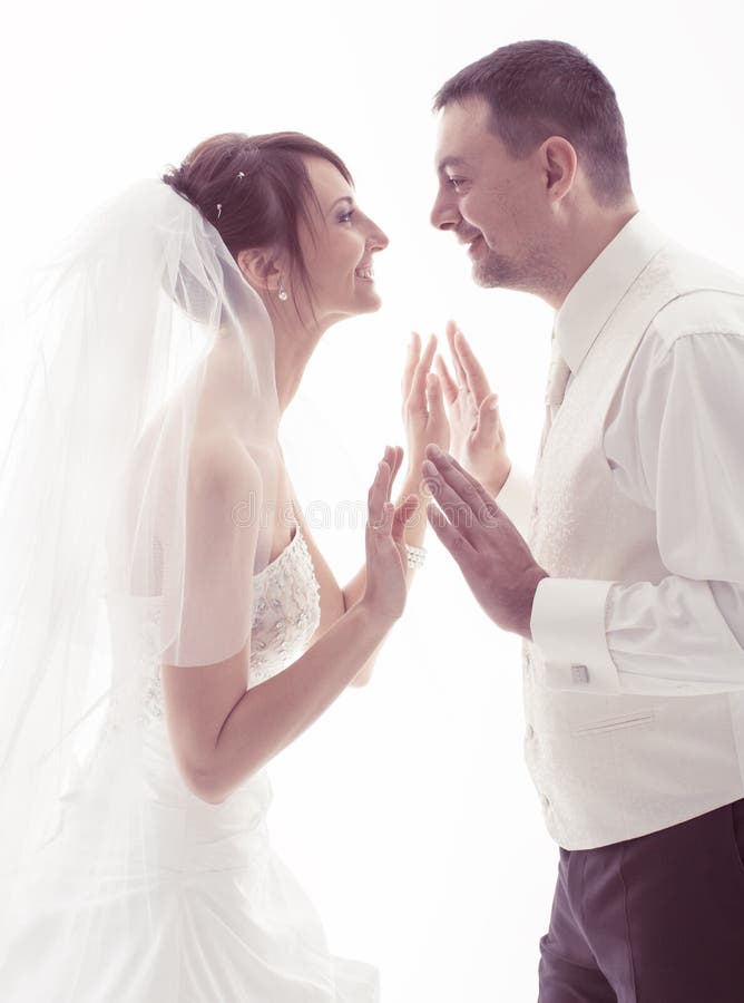 Bride and Groom Face To Face on White Background Stock Photo - Image of ...