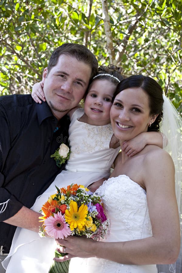 Bride and flower girl stock photo. Image of outdoors - 15238310