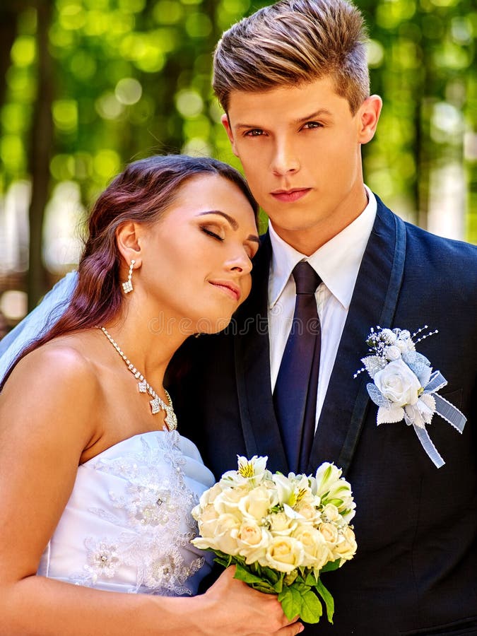 Bride and Groom with Flower Outdoor Stock Photo - Image of bridal, love ...