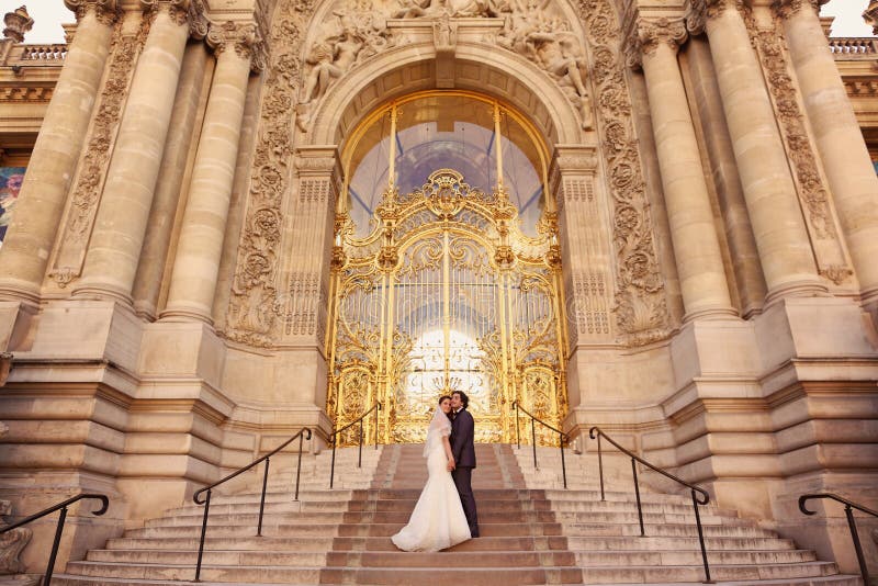 Bride and Groom in Front of a Big Building Stock Photo - Image of girl ...