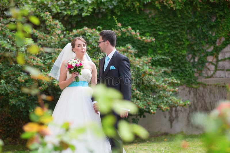 Bride and Groom in a Garden Stock Image - Image of groom, celebration ...
