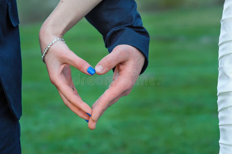 Bride and Groom Hands Making Heart Stock Photo - Image of conceptual ...