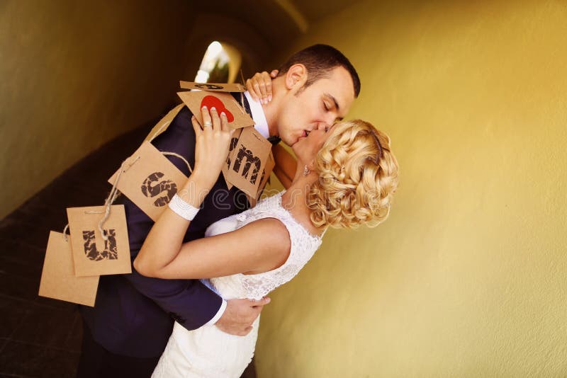 Bride and groom having fun stock image. Image of hugging - 57853397