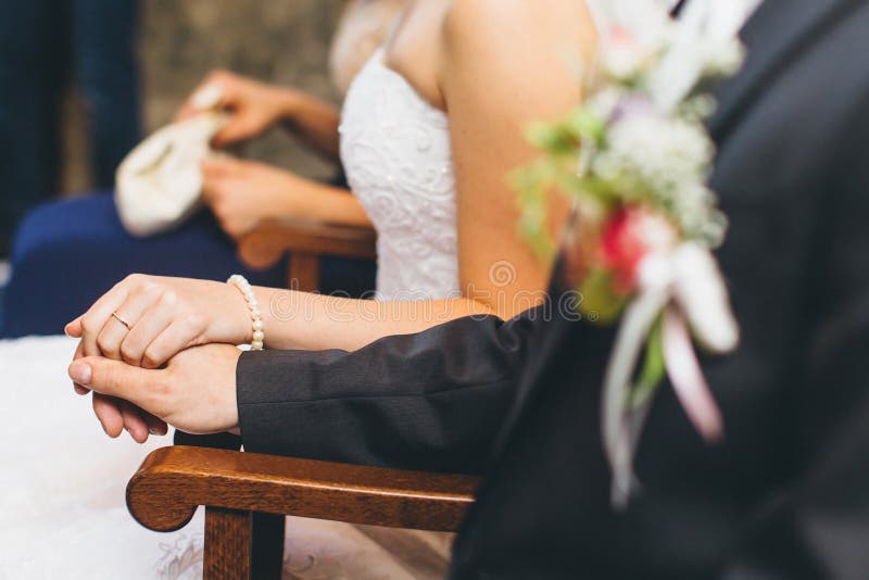 The Bride and Groom Hold Each Other& X27;s Hands Stock Photo - Image of ... The Bride and Groom Hold Each Other& X27;s Hands Stock Photo - Image of ...