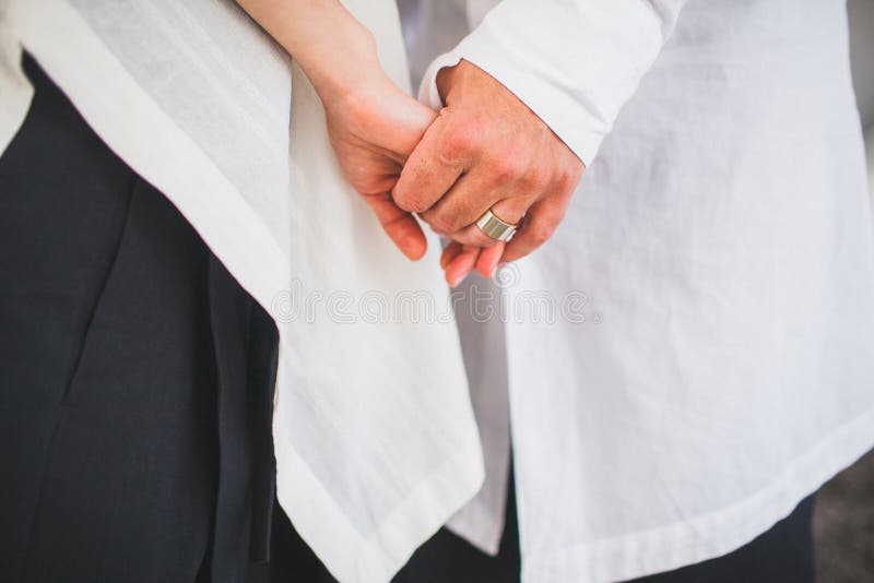 The Bride and Groom Hold Each Other& X27;s Hands Stock Image - Image of ... The Bride and Groom Hold Each Other& X27;s Hands Stock Image - Image of ...