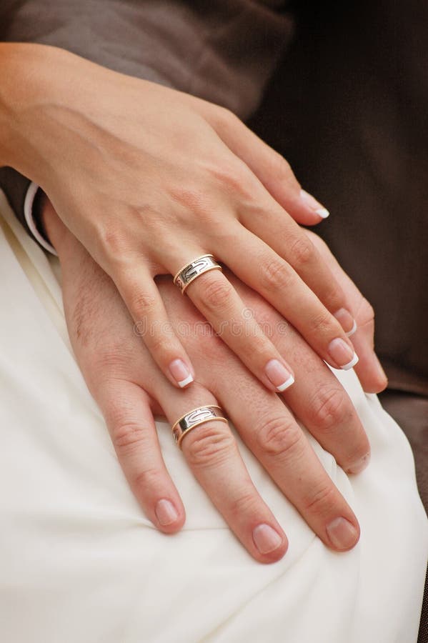The Bride and Groom Hold Hands Together with Rings Stock Photo - Image ...