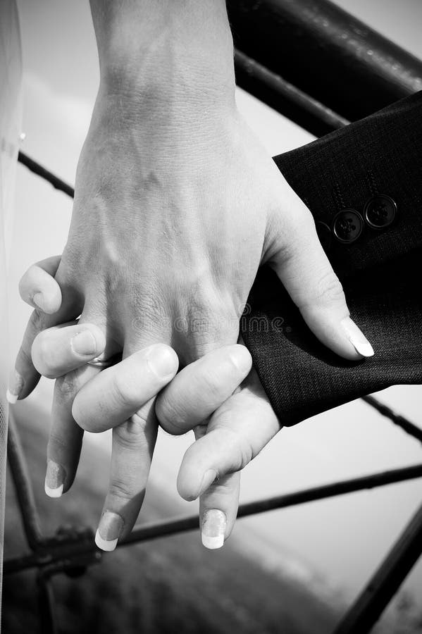 The Bride and Groom Hold Hands Together with Rings Stock Image - Image ...