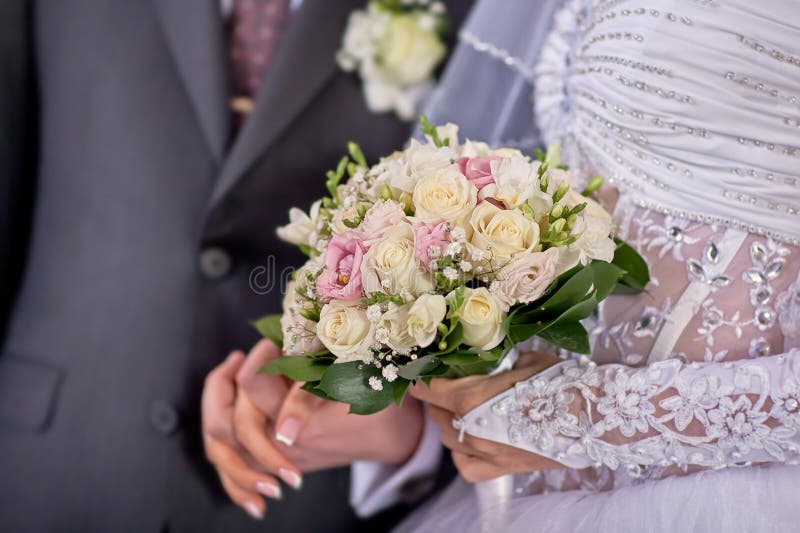 Bride and Groom Holding Hands Stock Image - Image of jewelry, couple ...