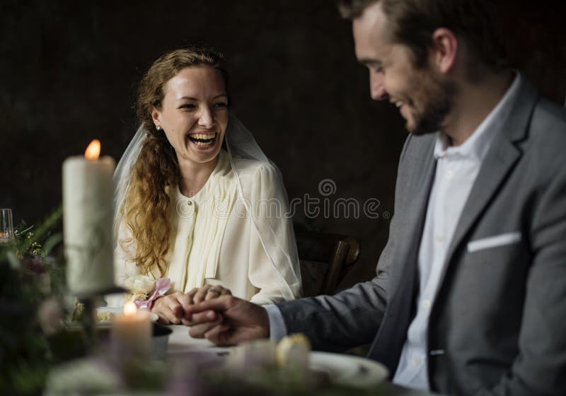 Bride and Groom Holding Hands on Wedding Reception Stock Image - Image ...