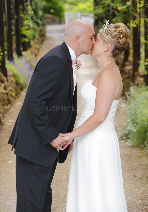 Bride and Groom kissing stock image. Image of happy, kiss - 50947