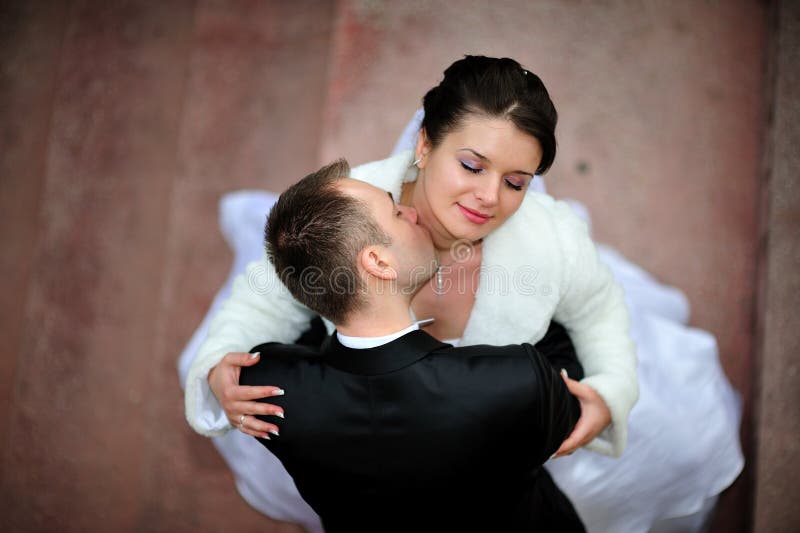 Bride and groom kissing stock image. Image of adults - 16372979