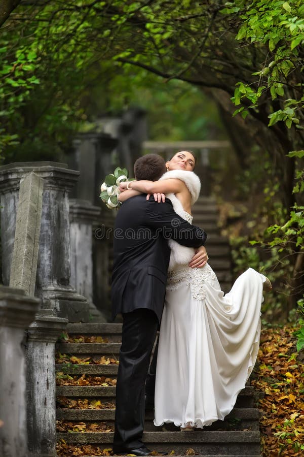 Bride and groom kissing stock image. Image of desire - 24434771