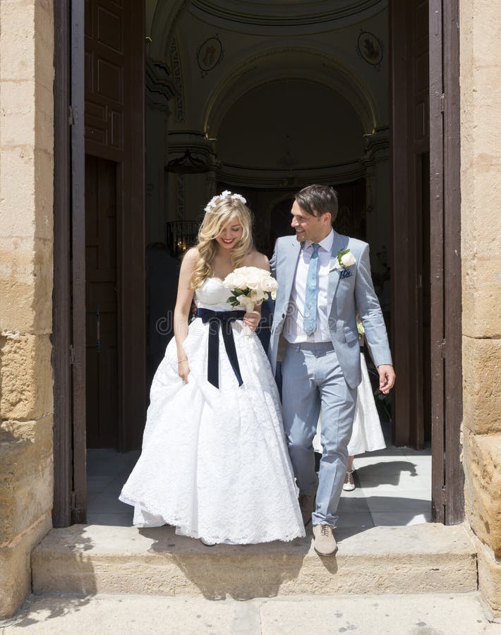 Bride and Groom Leaving the Church Stock Photo - Image of husband ...