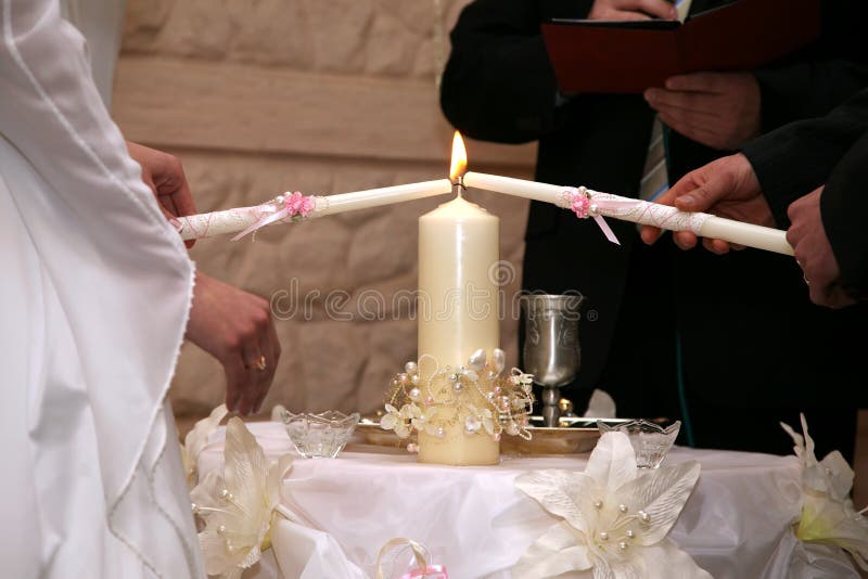 Bride and Groom Light the Wedding Candle at the Ceremony Stock Image ...