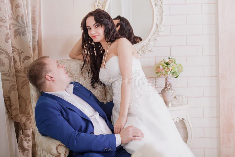 Bride and Groom Looking Fondly of Each Other Indoor Stock Photo - Image ...
