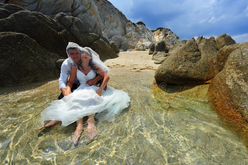 Bride and Groom Portrait - Trash the Dress Stock Image - Image of ...