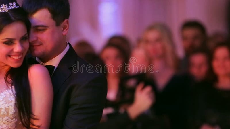 Bride and Groom Share Their First Dance Together on Their Wedding Day ...
