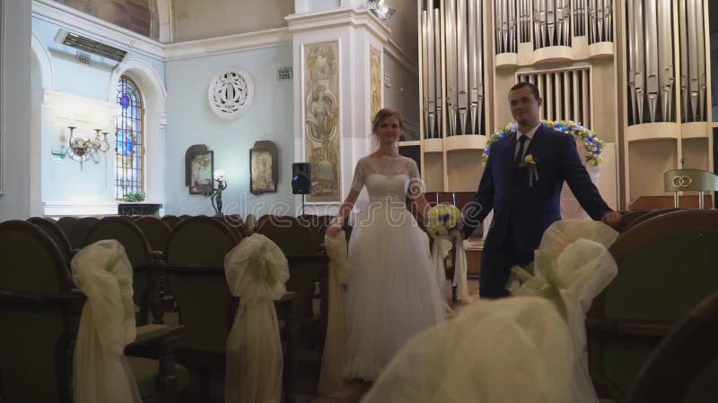 Bride and Groom Standing in the Temple between the Benches Stock Video ...