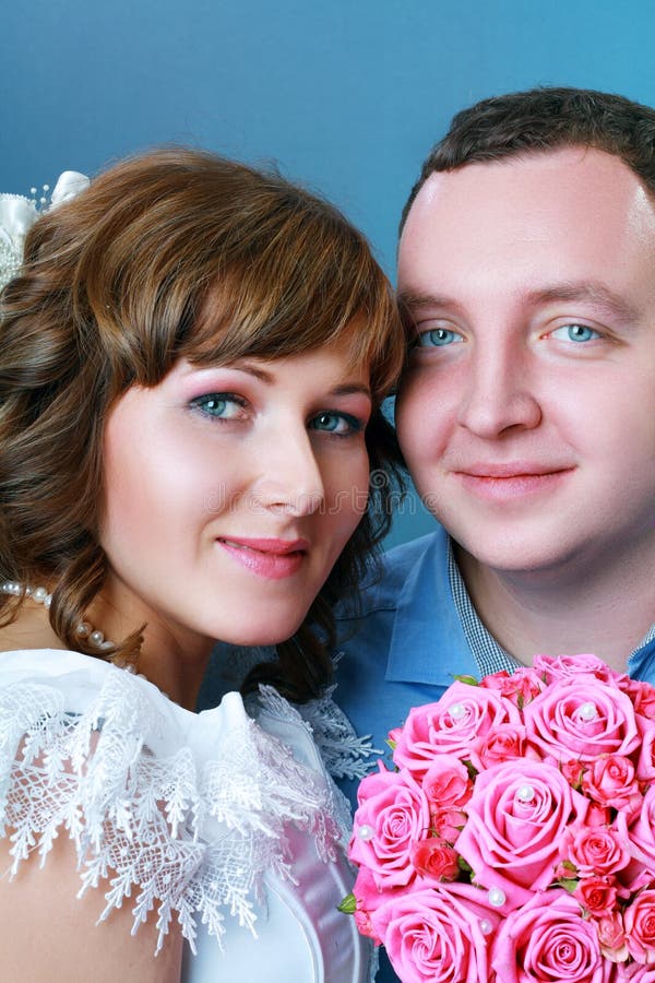 Bride and groom in studio stock image. Image of bridal - 28689599