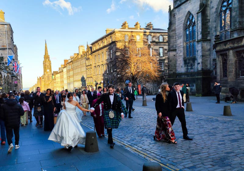 Bride and Groom Walking after Wedding at Edinburgh in Scotland ...
