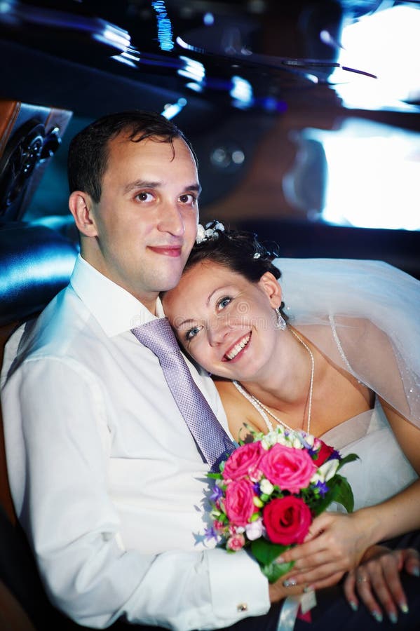 Bride and Groom in Wedding Limo Stock Photo - Image of white, yellow ...