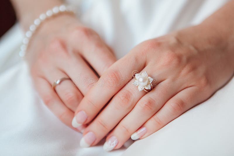 Bride Hand with Diamond Ring on White Dress Stock Photo - Image of ...