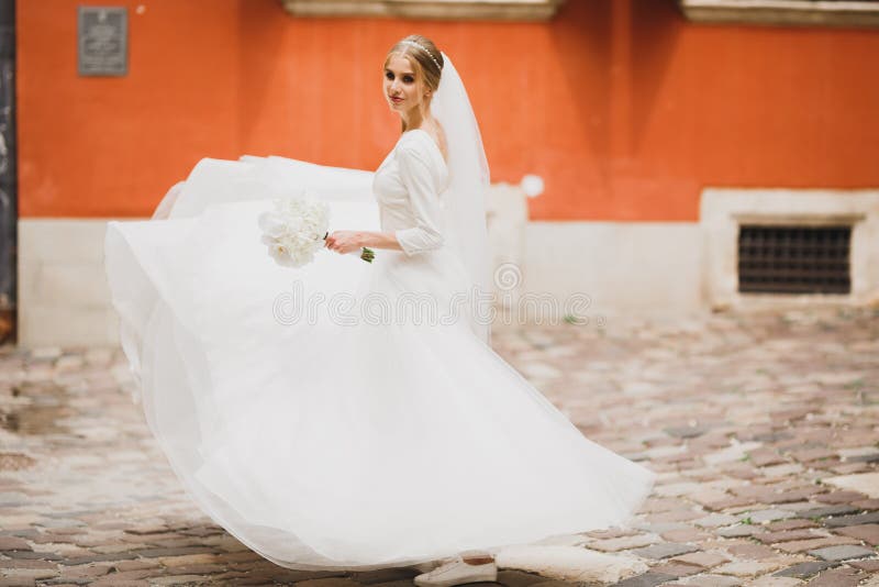 Bride Holding Big and Beautiful Wedding Bouquet with Flowers Stock ...