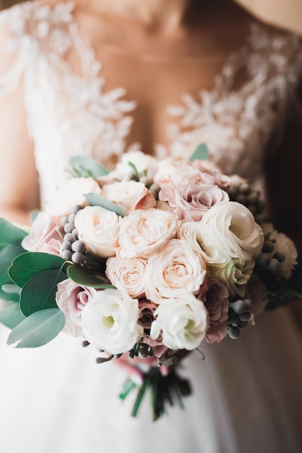 Bride Holding Big and Beautiful Wedding Bouquet with Flowers Stock ...