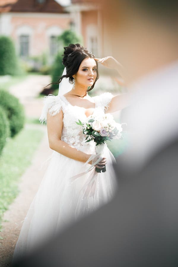 Bride Holding Big and Beautiful Wedding Bouquet with Flowers Stock ...