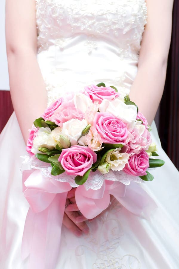 Bride holding bouquet stock photo. Image of happy, florist - 14609104