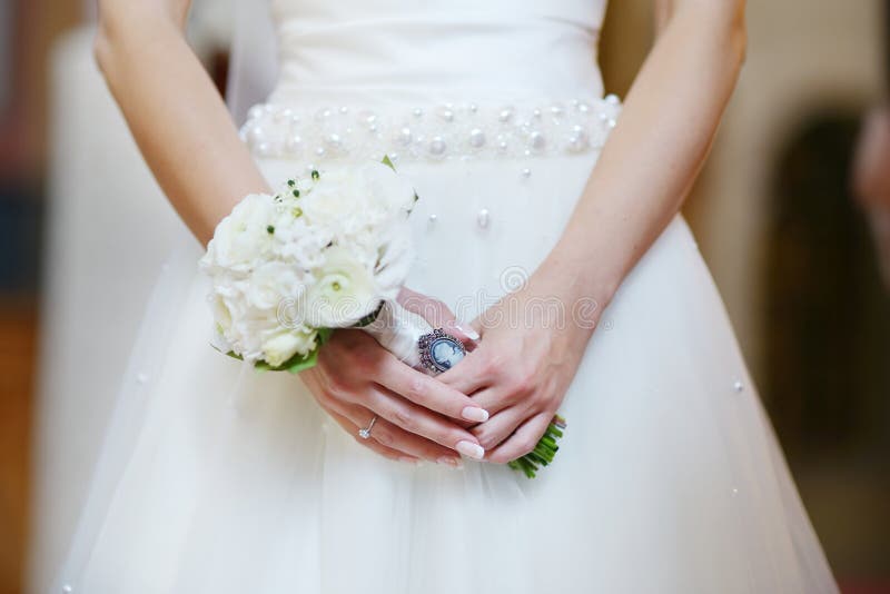 Bride Holding Flowers at the Wedding Ceremony Stock Image - Image of ...