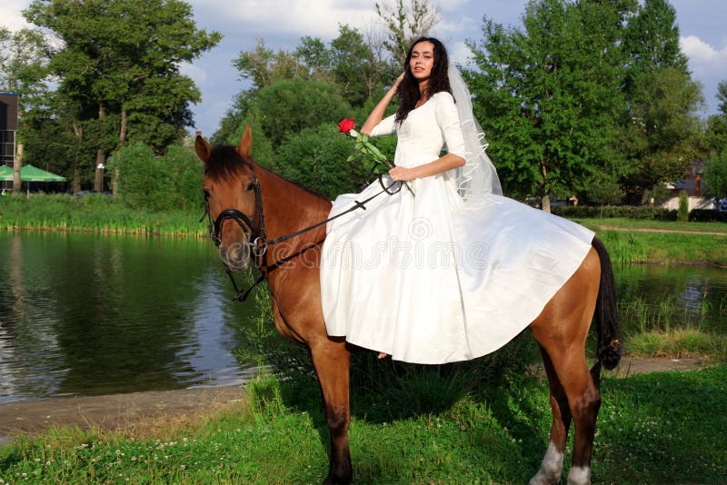 Bride horseback stock photo. Image of love, outdoors - 17537936