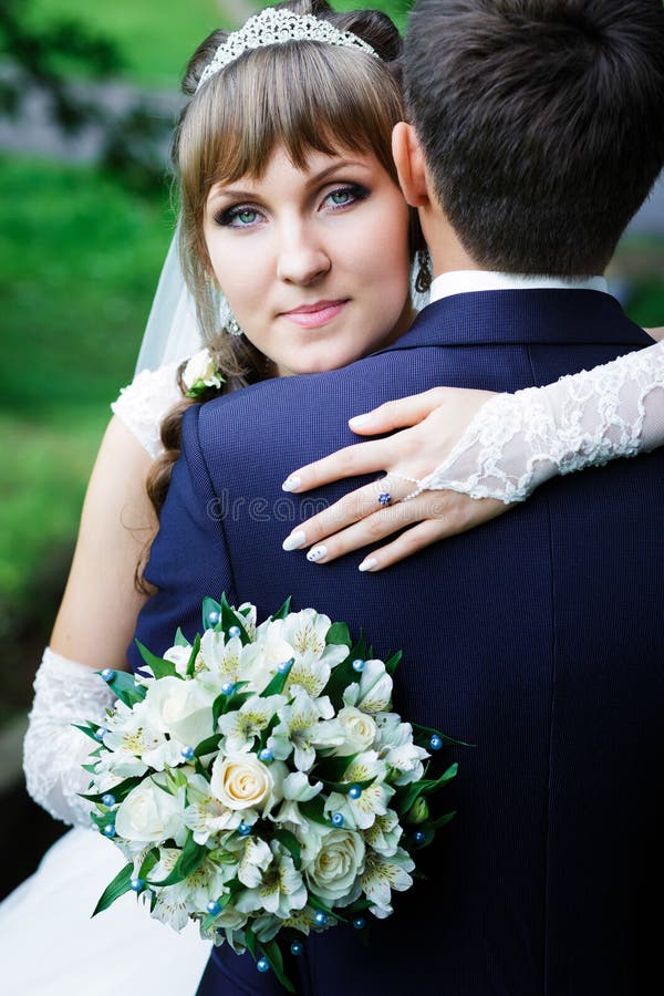 Bride hugging groom stock photo. Image of union, closeup - 50003984