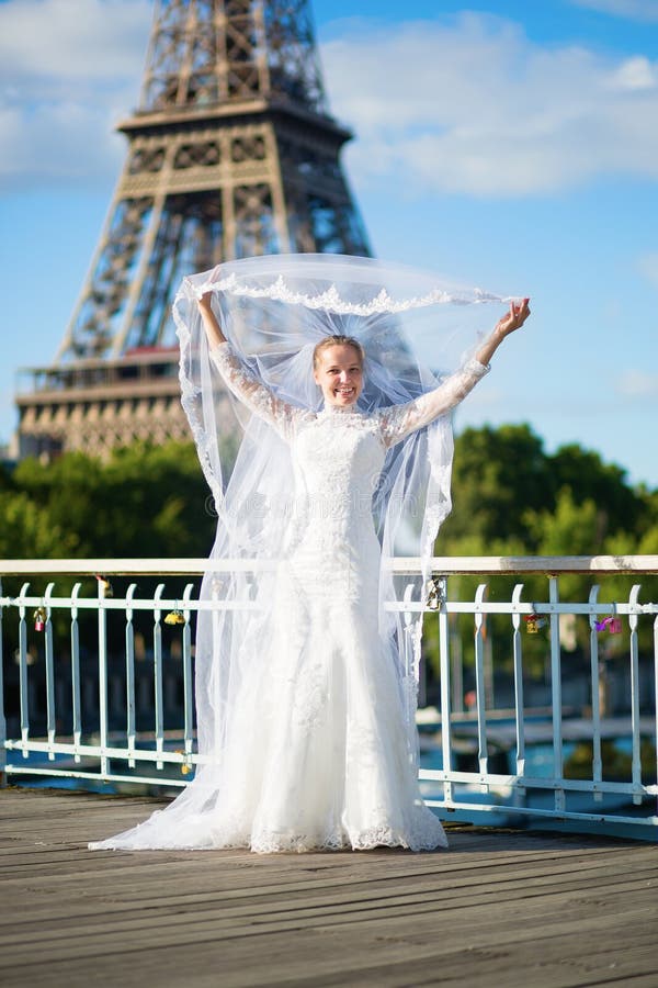 Bride with Long Veil Near the Eiffel Tower Stock Photo - Image of ...