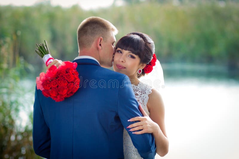 The Bride are Looking in the Camera Next To the Groom Stock Image ...