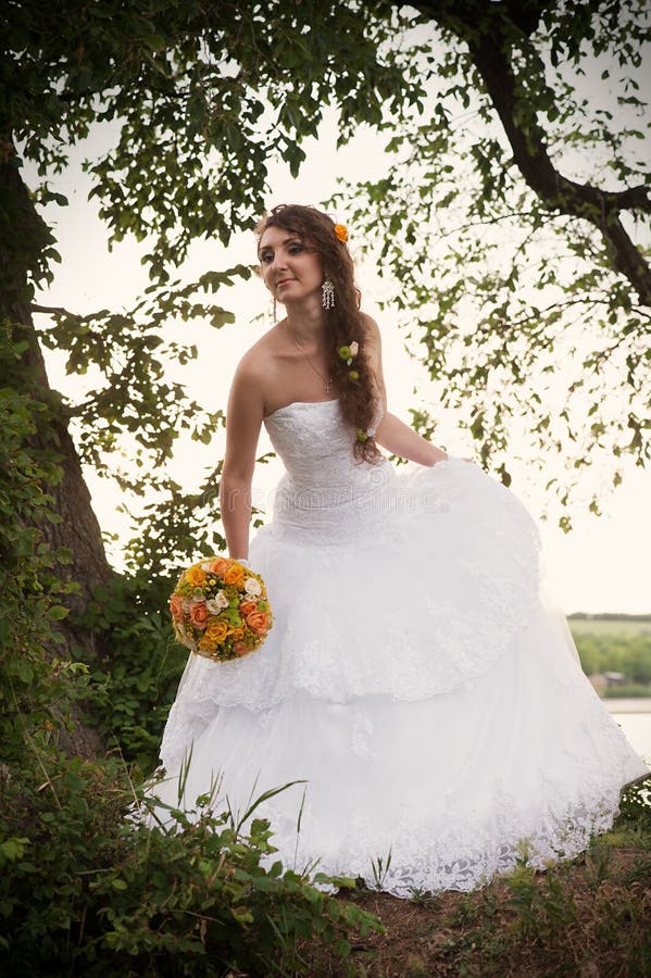 Bride Looking Down, Outdoors Stock Photo - Image of marry, people: 34073244