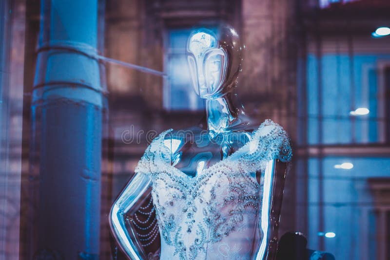 Bride Mannequin Behind Storefront Glass Stock Photo - Image of glass ...