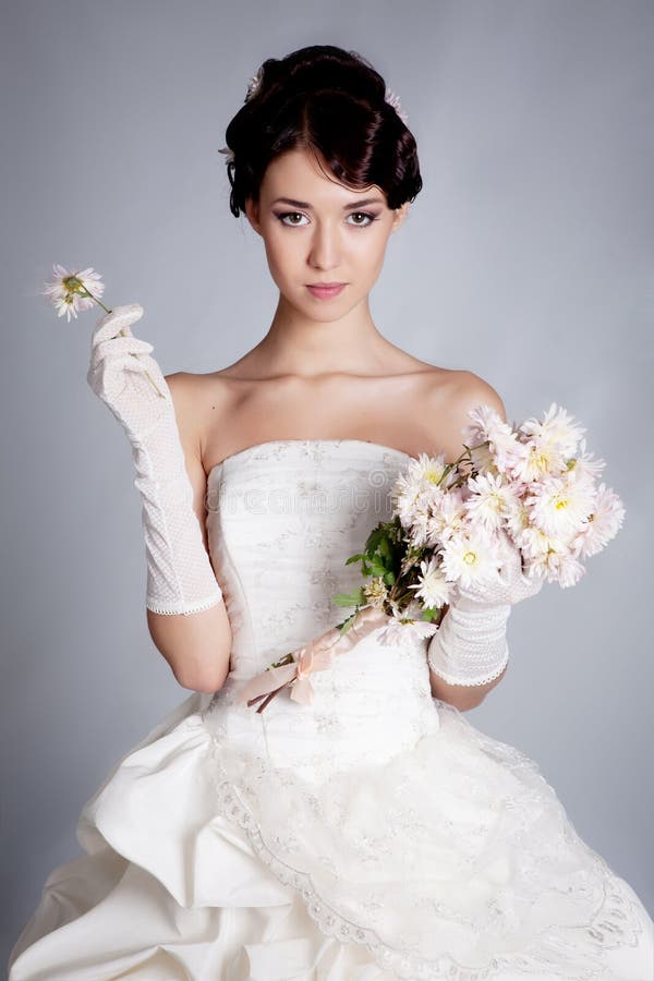 Bride portrait in studio stock photo. Image of cute, flowers - 64866788