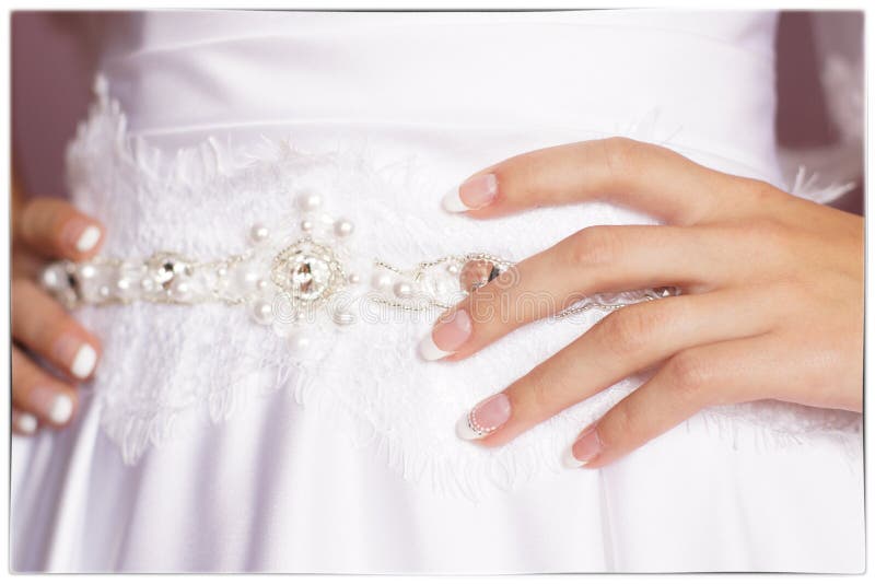 The Bride Put Her Hands on His Belt, Beautiful Manicure Stock Image ...