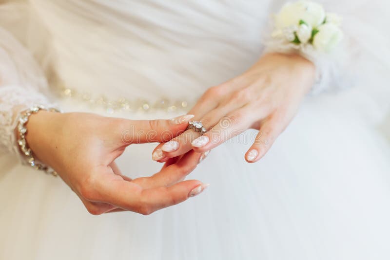 Bride& X27;s Hand Wearing a Ring at the Wedding Stock Photo - Image of ...