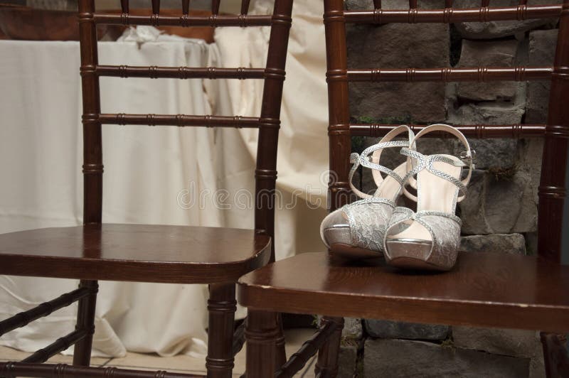 Bride shoes on chair stock image. Image of ceremony, lifting - 66812811