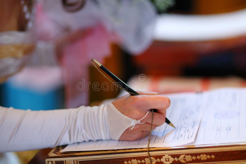 Bride signing a paper stock image. Image of writing, document - 12210185