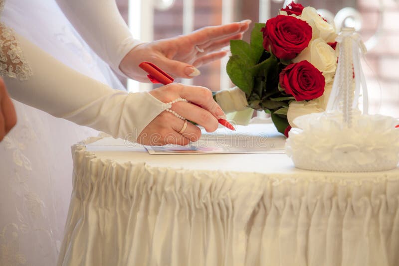 Bride Signs the Marriage Certificate Stock Image - Image of love ...